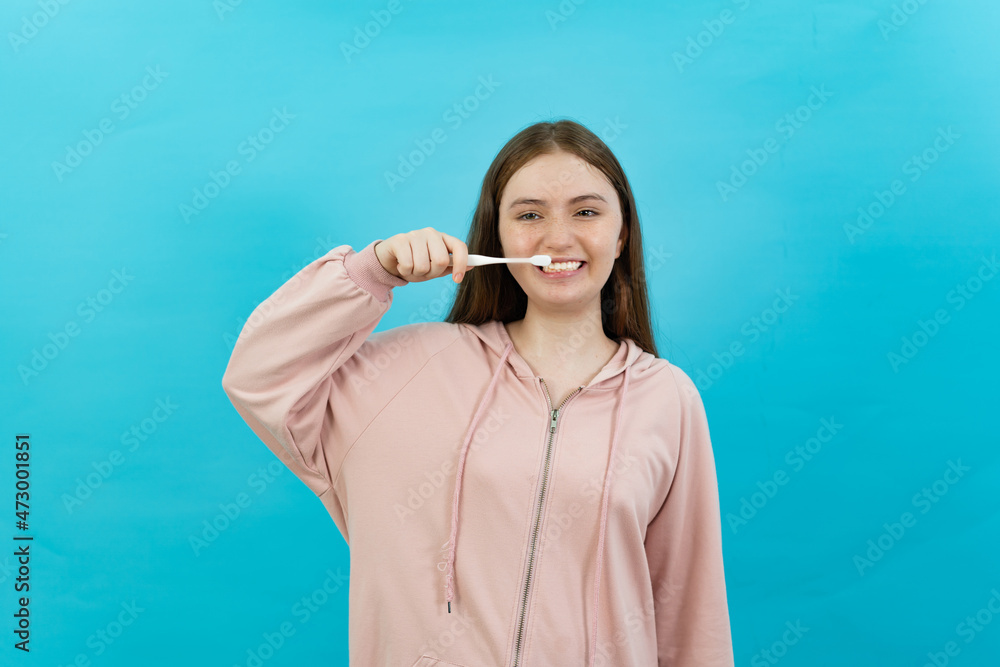 Front view half-body image of a happy young cute Caucasian teenage girl ...