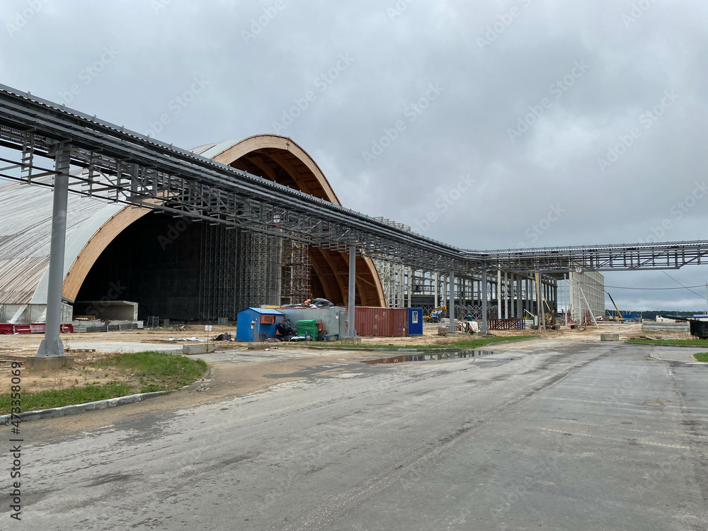 warehouse building with large windows for storing equipment, a ...