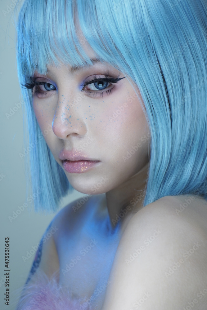 Pretty Asian girl with blue hair represents the LGBT community. She has ...