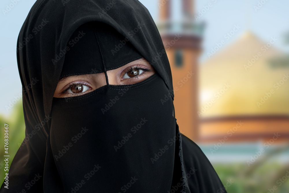 Portrait of Muslim little girl with beautiful eyes wearing hijab or ...