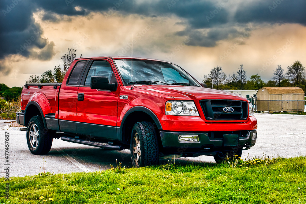 2006 4x4 red ford f150 step body pickup truck Stock Photo | Adobe Stock
