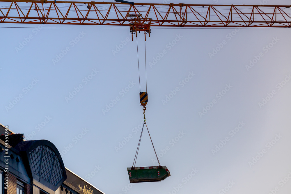 Build and structure concept, Yellow crane with cable or sling in the ...