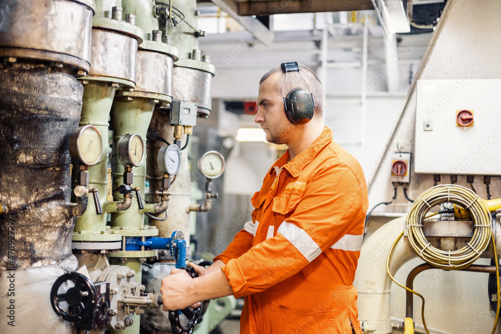 engineer checks mechanisms Stock Photo | Adobe Stock