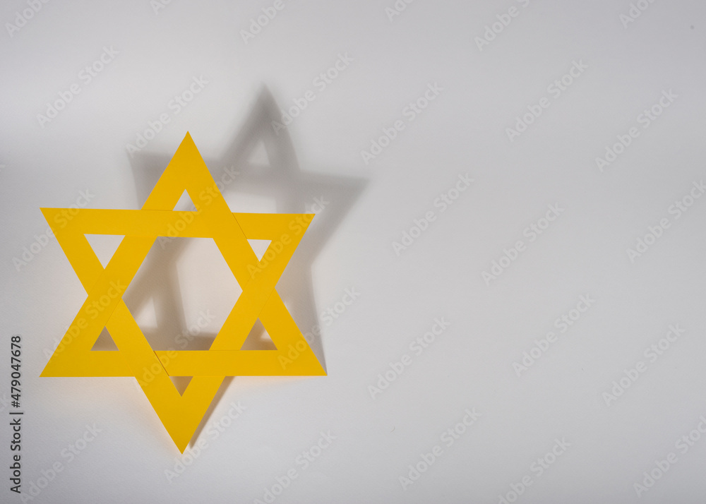 Yellow Star of David with shadow on white background. International ...