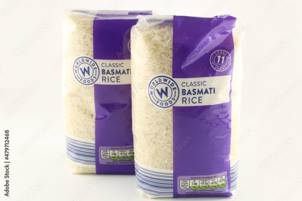 Basmati rice. Two packets of classic Basmati rice isolated on white ...