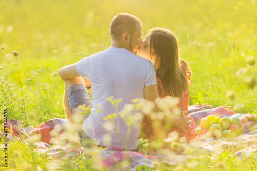 guy and girl kissing. back view. couple in love hugging on a pic Stock ...