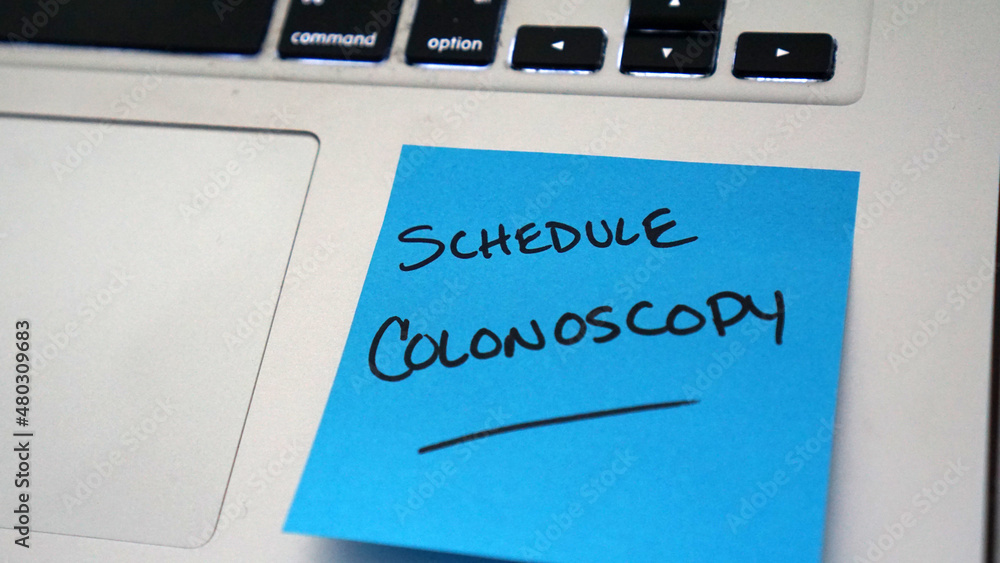 Sticky note reminder to schedule colonoscopy, an important screening ...