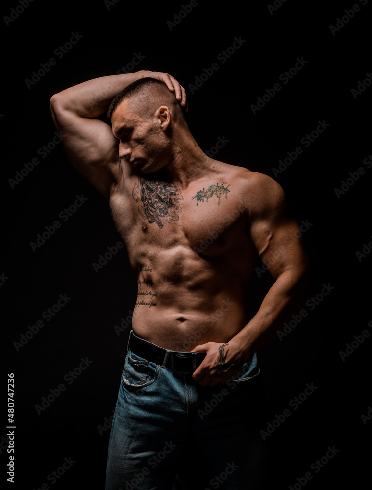 Powerful strong man with muscular bodybuilder Stock Photo | Adobe Stock