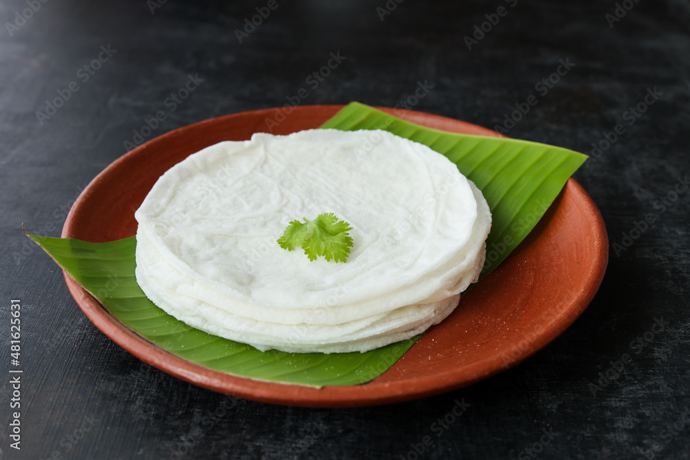 Rice Pathiri , pathir flat bread with spicy chicken curry, coconut milk ...