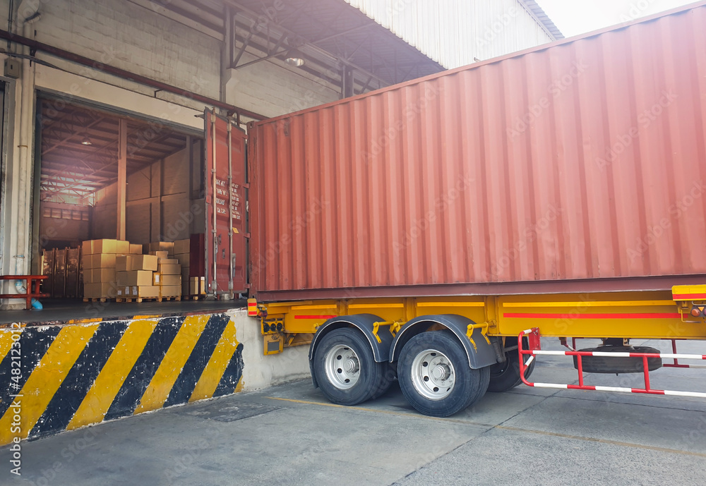 Trailer Trucks with Cargo Container Loading at Dock Warehouse. Shipment ...