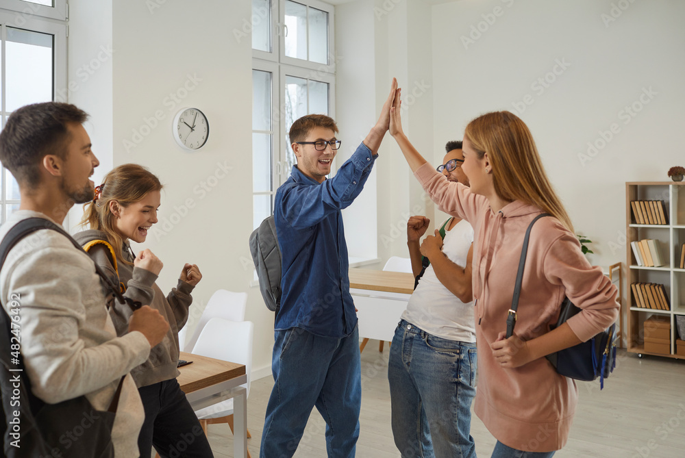 Foto de Stock Nice job. Yes. Well done. Cool. Team of cheerful ...