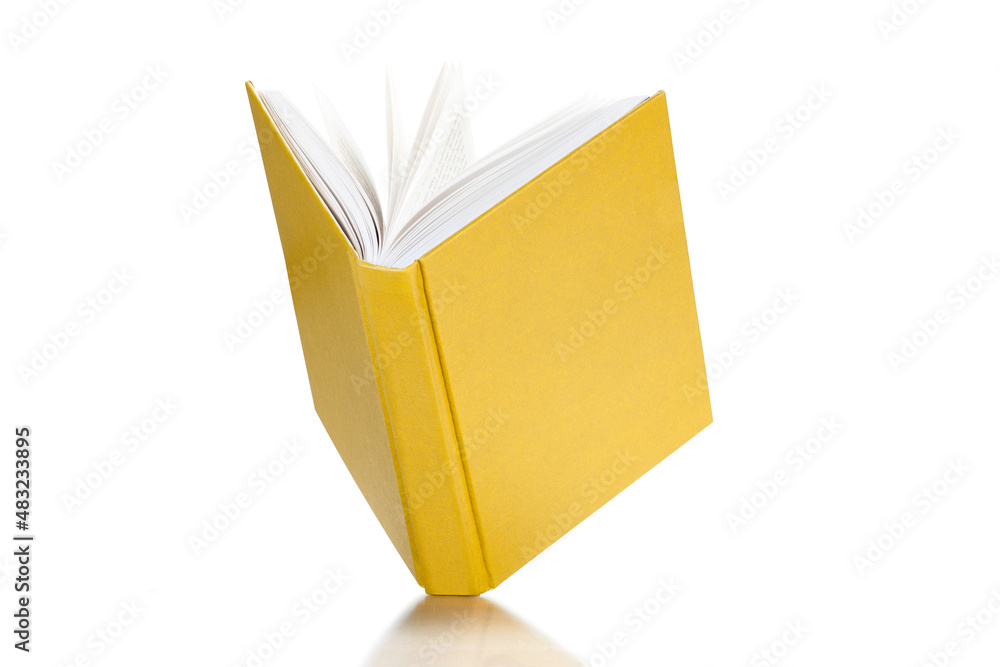 Open yellow cover book on white background Stock Photo | Adobe Stock