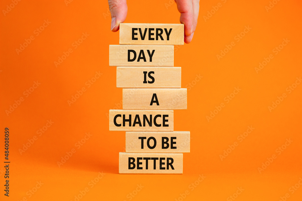 Chance to be better symbol. Wooden blocks with words Every day is a ...