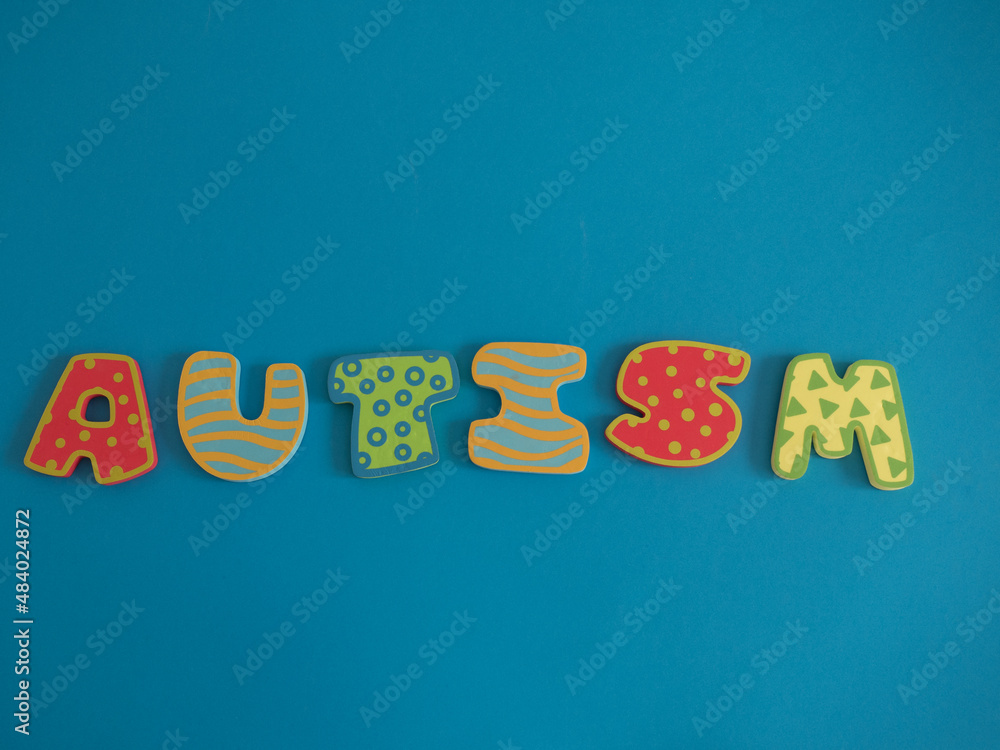 Text of the name autism with foam letters with a blue background Stock ...