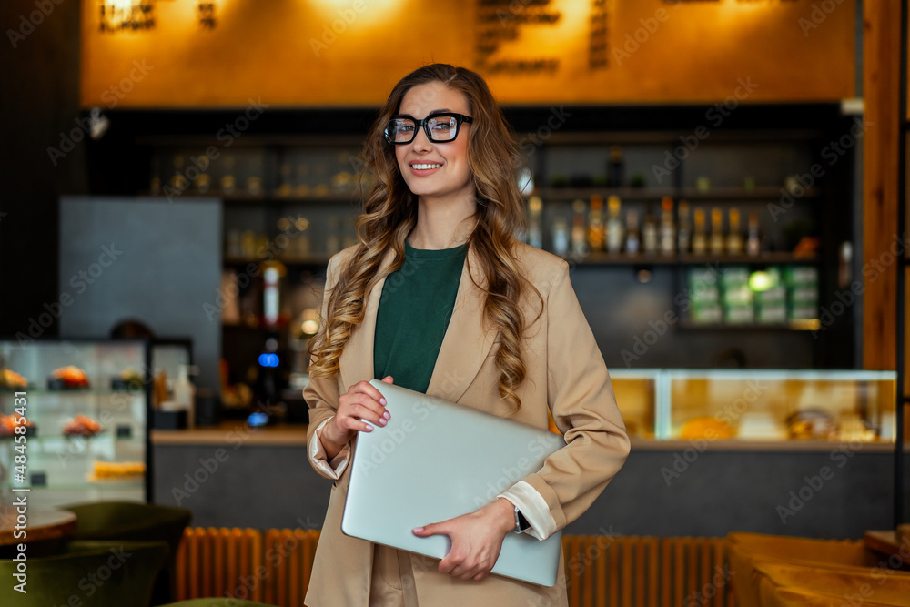Business Woman Restaurant Owner With Laptop In Hands Dressed Elegant ...