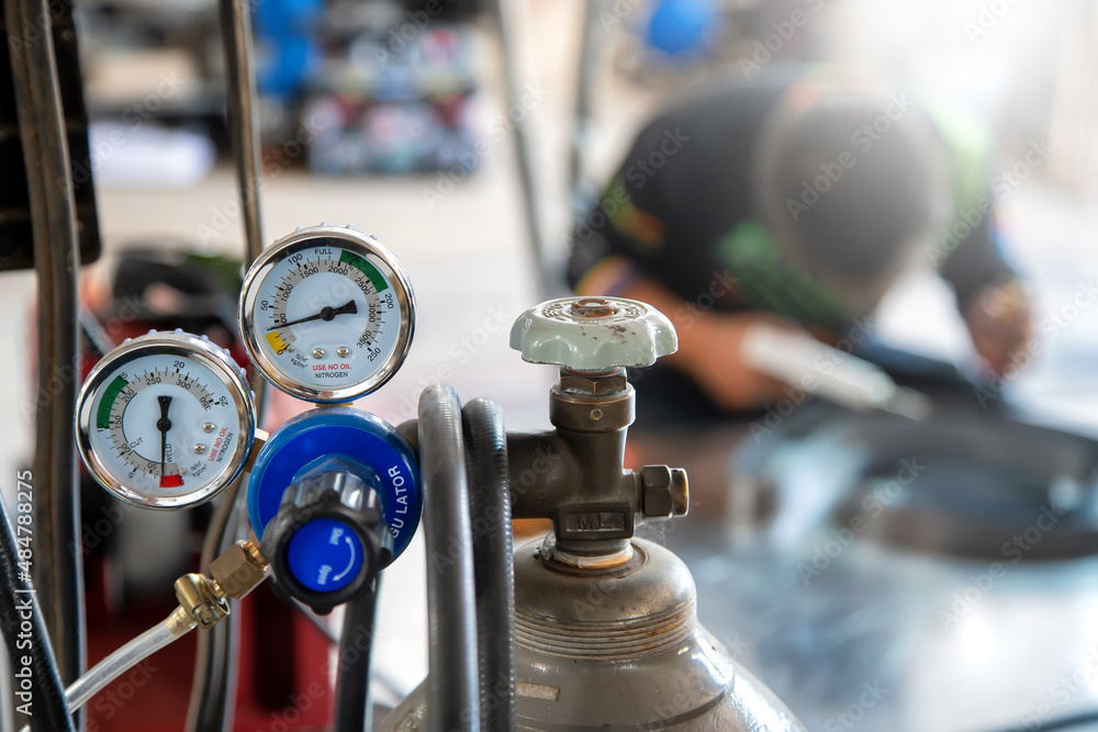 Argon welding workers use argon guns to weld steel plates. Stock Photo ...