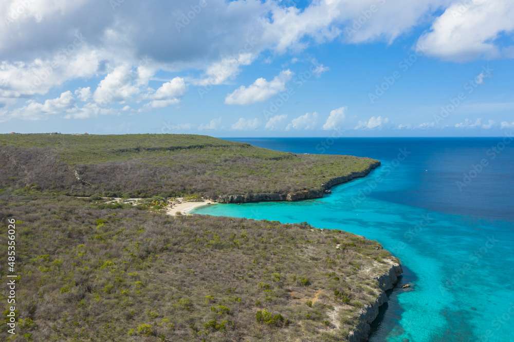 Aerial view of coast scenery with the ocean, cliff, and beach around ...