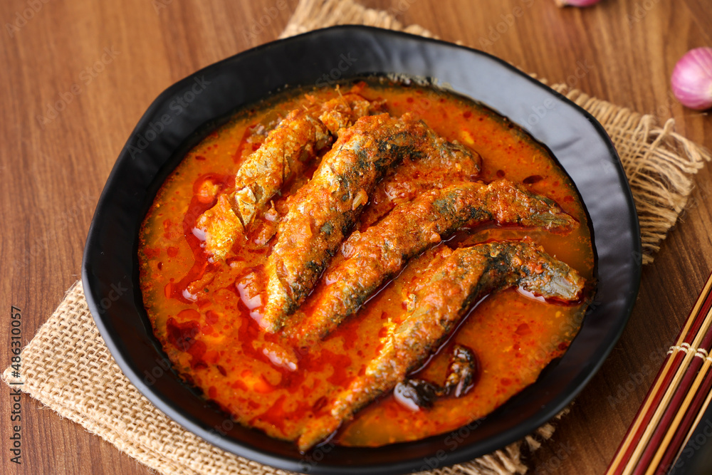 Top view of Sardine fish curry hot spicy Kerala masala fish curry for ...