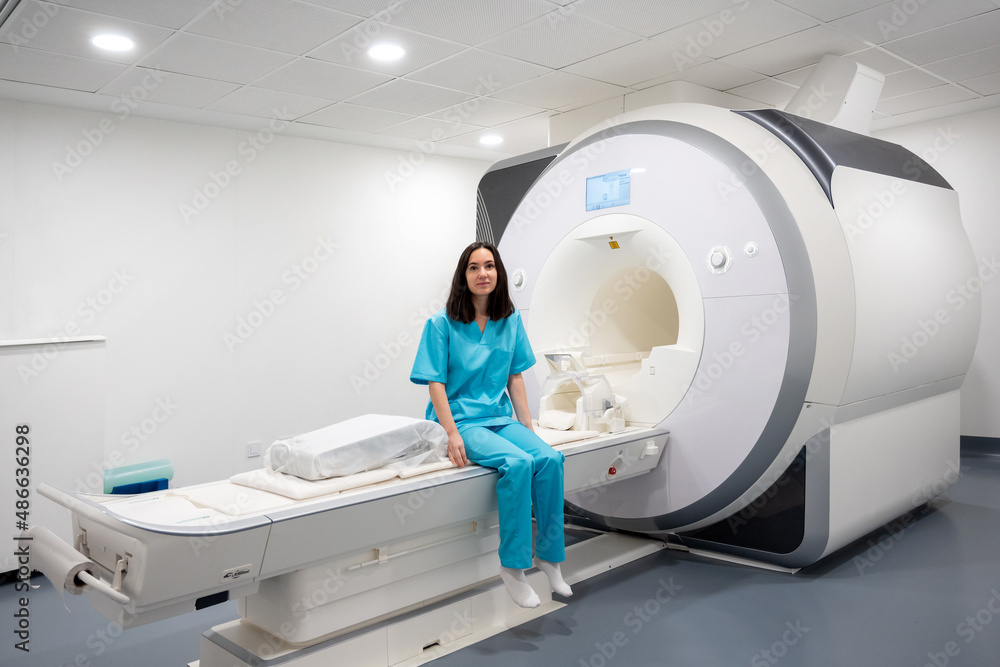 Female sitting on medical MRI scan Stock Photo | Adobe Stock