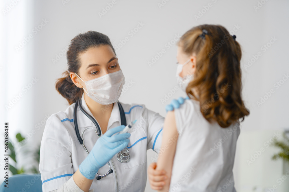 Doctor vaccinating child Stock Photo | Adobe Stock