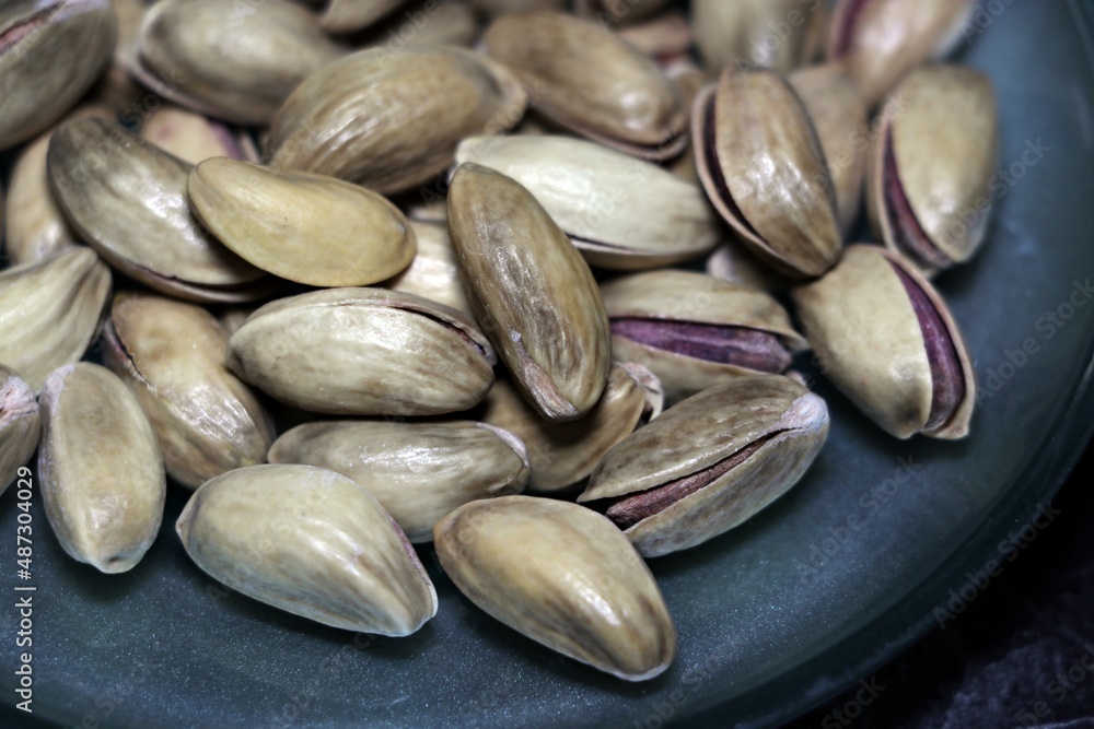 Stock-Foto „Pistachio is an edible shell fruit from the gum tree family ...