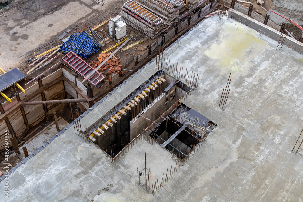 Cast concrete building construction. Cast floor slab, elevator shafts ...