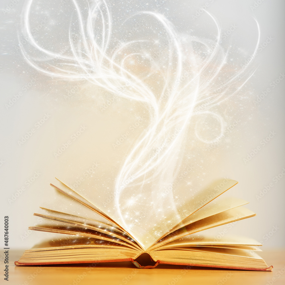 Magical words can transport you to different worlds. Shot of an open ...