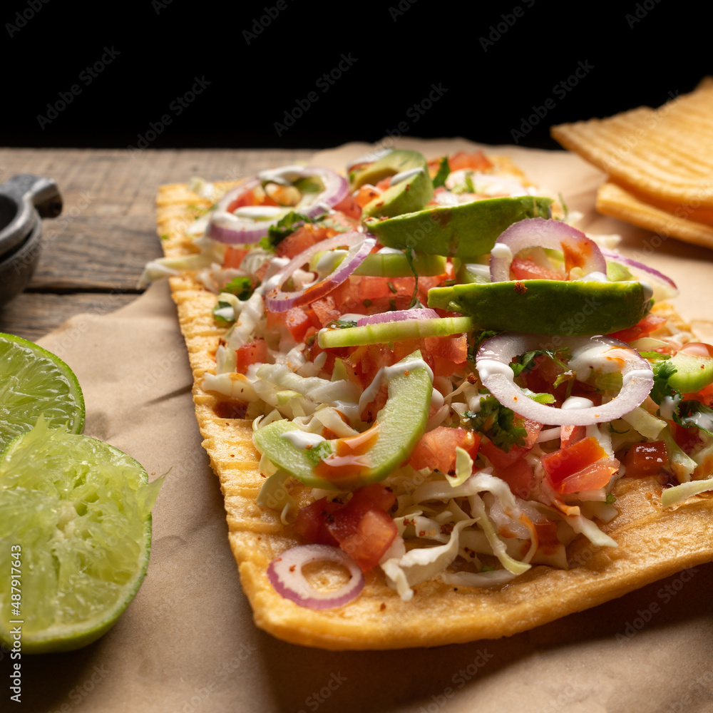 Snack made with wheat flour called chicharron preparado with sauce and ...