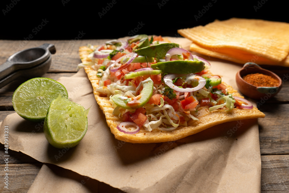 Snack made with wheat flour called chicharron preparado with sauce and ...