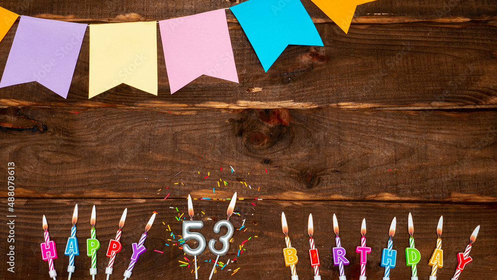 Top view, birthday decorations from letters of candles with fire and ...
