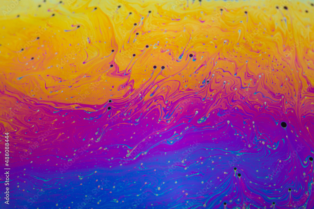 Rainbow colors created by soap, bubble,colors mix from oil makes can ...