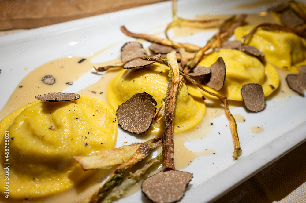 Italian food, fresh home made red potato stuffed pasta tortellacci or ...