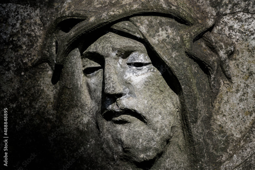 Destroyed ancient statue of Jesus Christ in a crown of thorns as symbol ...