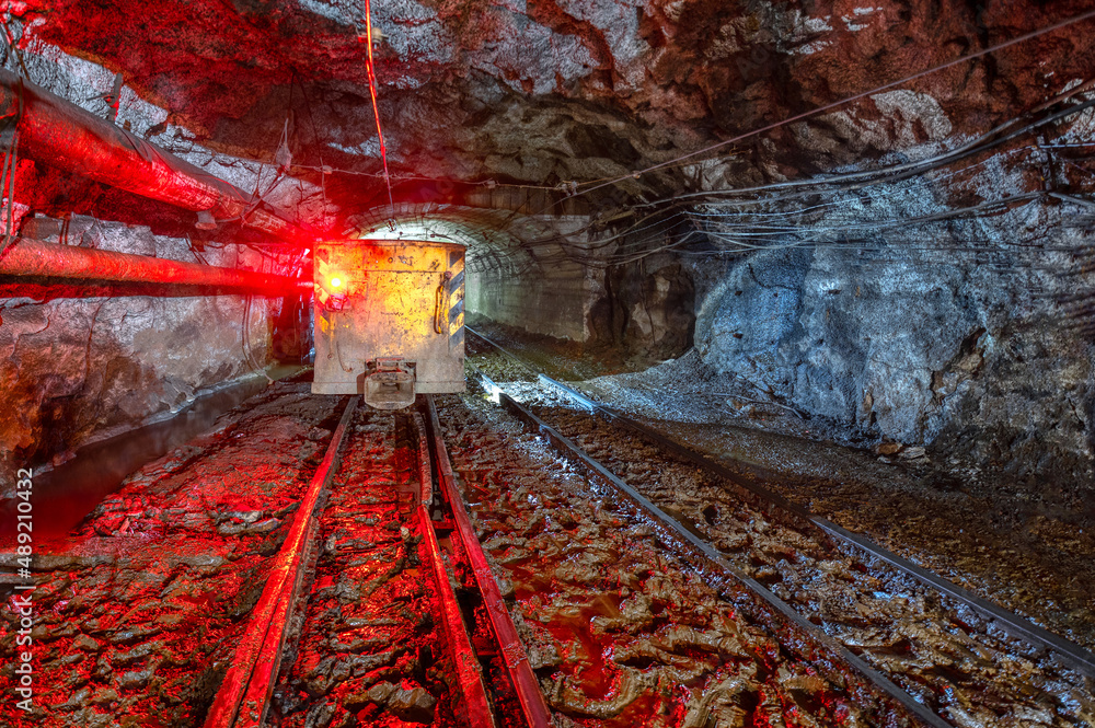 Underground mine. Underground railway for transporting ore. Mine ...