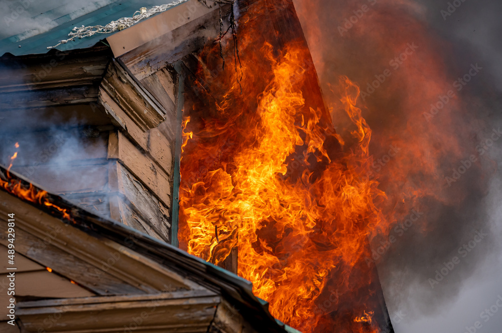 A two-story house fully engulfed structure fire Stock Photo | Adobe Stock