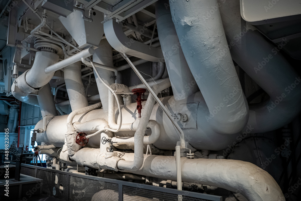 View of the chaotic pipe installations aboard the USS Intrepid aircraft ...