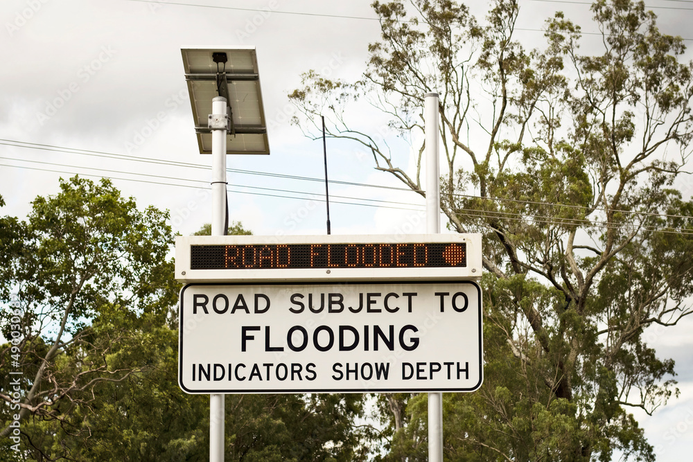 Road Flooded - Road subject to flooding warning sign. Road Closed ...