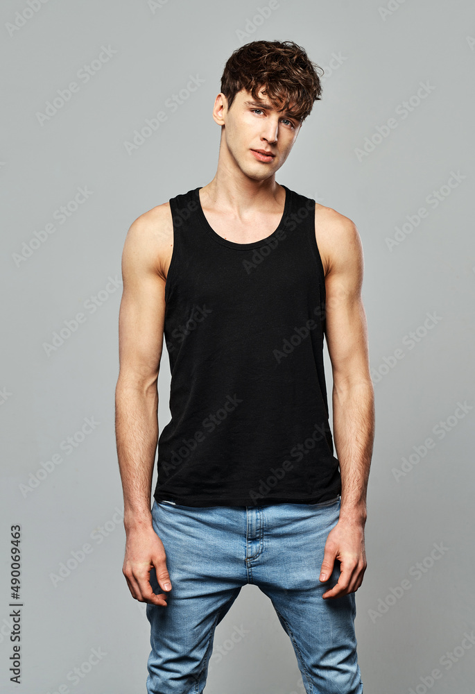 Handsome man wear black tank top Stock Photo | Adobe Stock