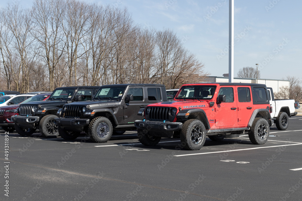Jeep Wrangler display at a Stellantis dealership. Jeep offers the ...