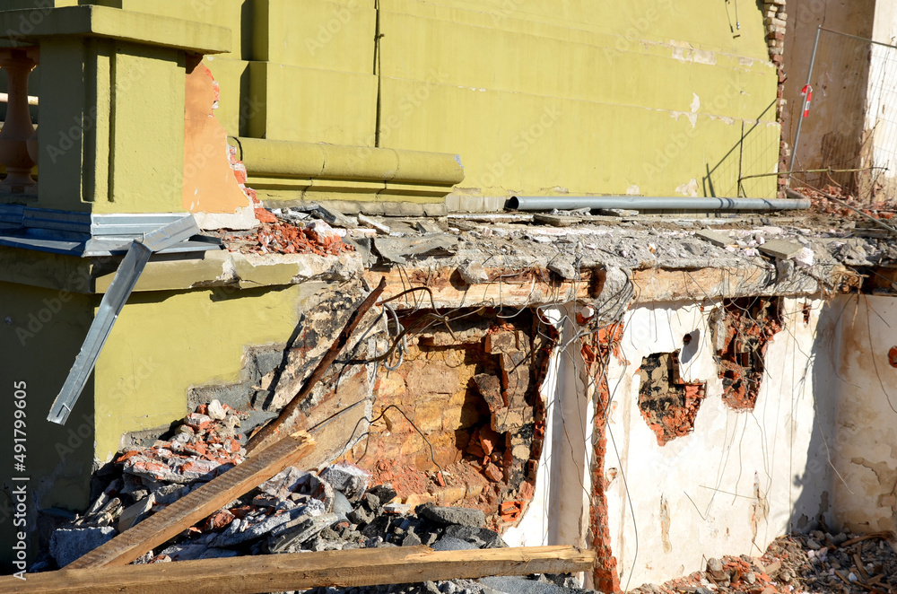demolition of an apartment building worker on a forklift using a ...