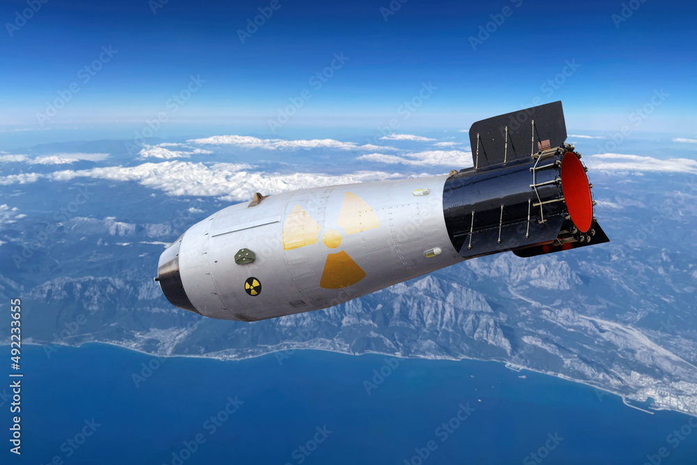 Nuclear bomb flies in the air. Atomic World War. Atom bomb 스톡 사진 | Adobe Stock