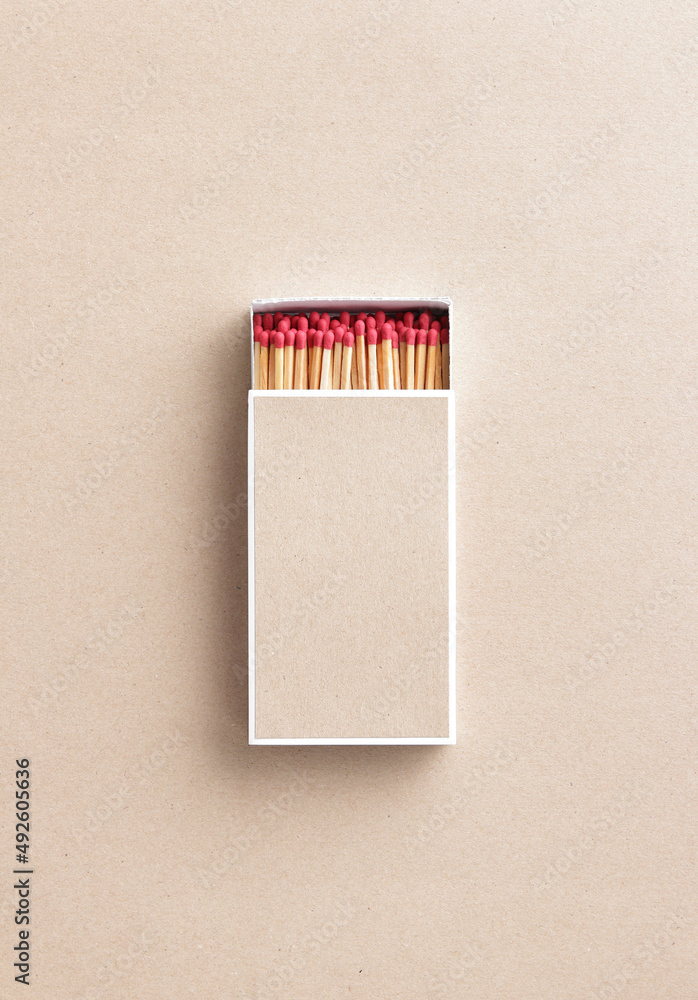 big size of matchbox on light brown paper background with copy space ...