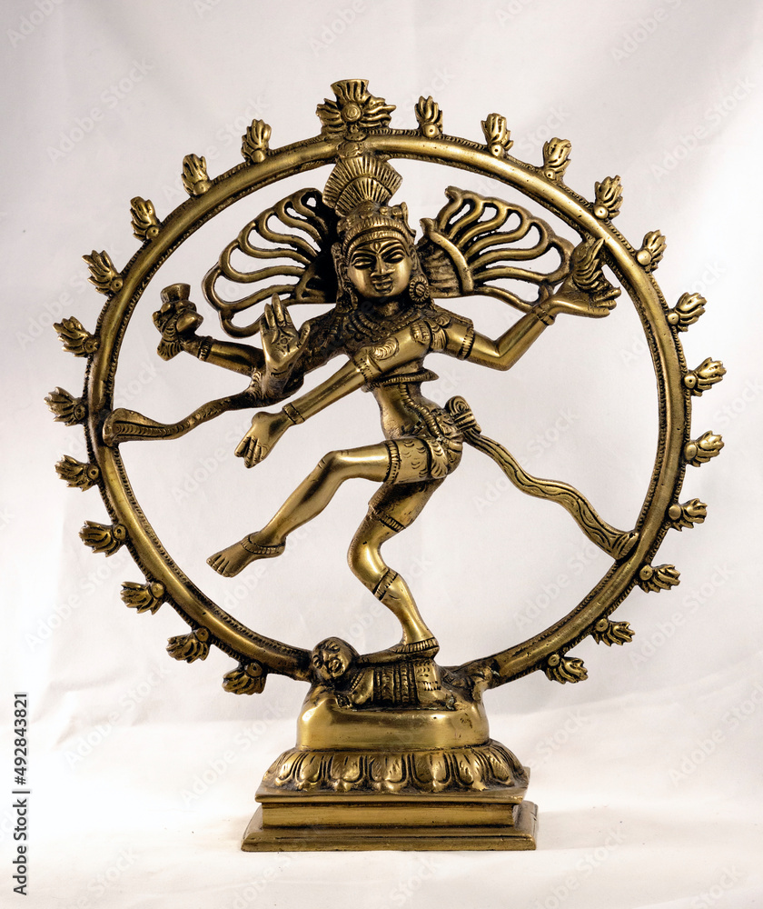 Bronze figurine in the form of Shiva dancing in the ring of lights ...