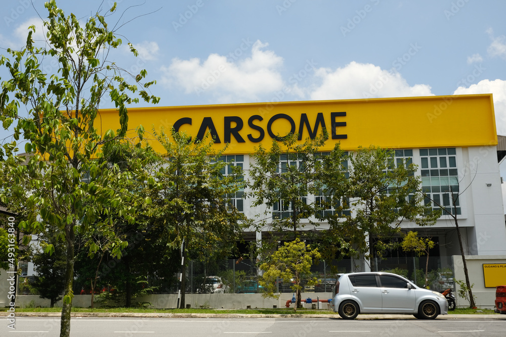 "Setia Alam, Malaysia- Circa March, 2022: A picture of Carsome warehouse block by tree with car ...