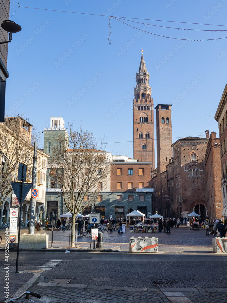 Stradivari Square and a view of the Torrazzo in Cremona located next to ...