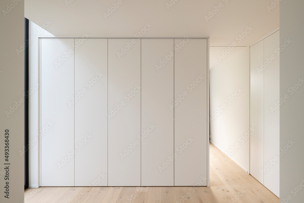 minimalist wardrobe Stock Photo | Adobe Stock