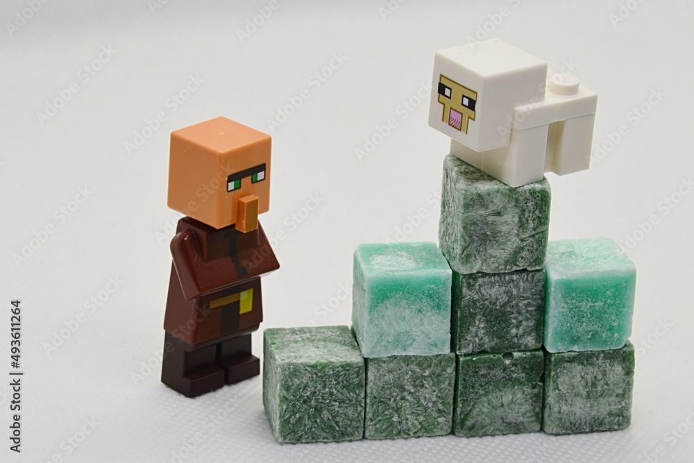 Foto de Stock LEGO Minecraft figure of villager is watching Minecraft ...