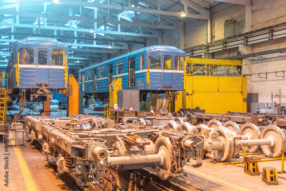 Electric depot of trains, wagons are installed on jacks. Procedure for ...