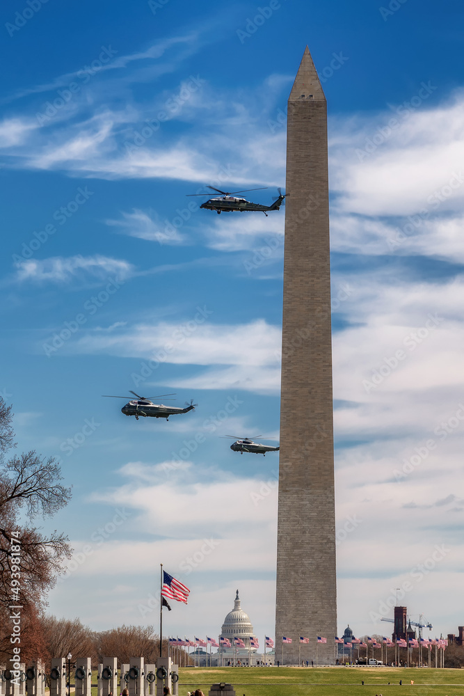 American President helicopters in flight at the Washington Monument in ...