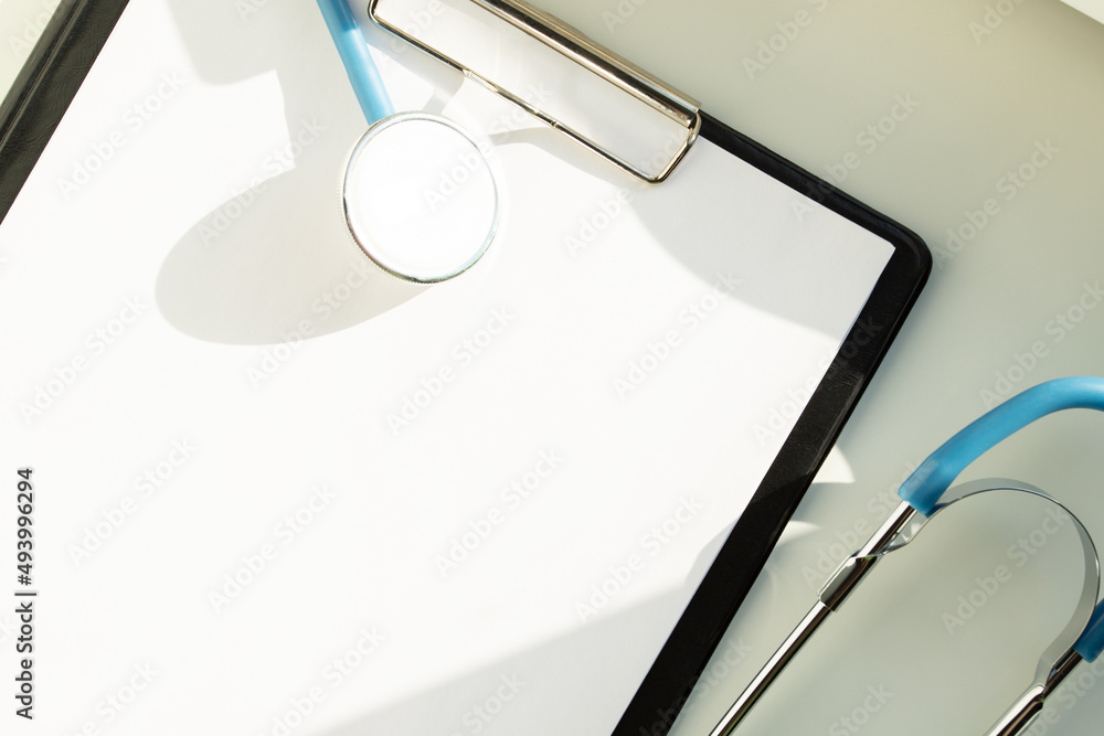 medical background, clipboard, checklist, mockup white sheet of paper ...
